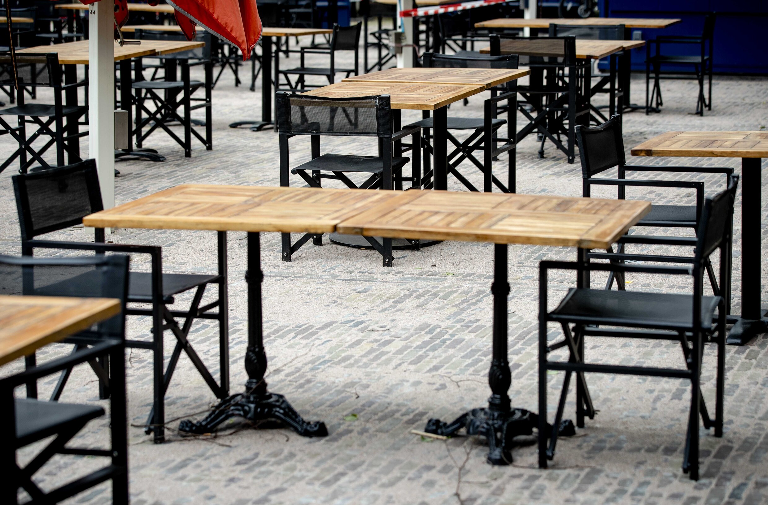 Horeca mag open: geen afstand voor huisgenoten | Het Parool