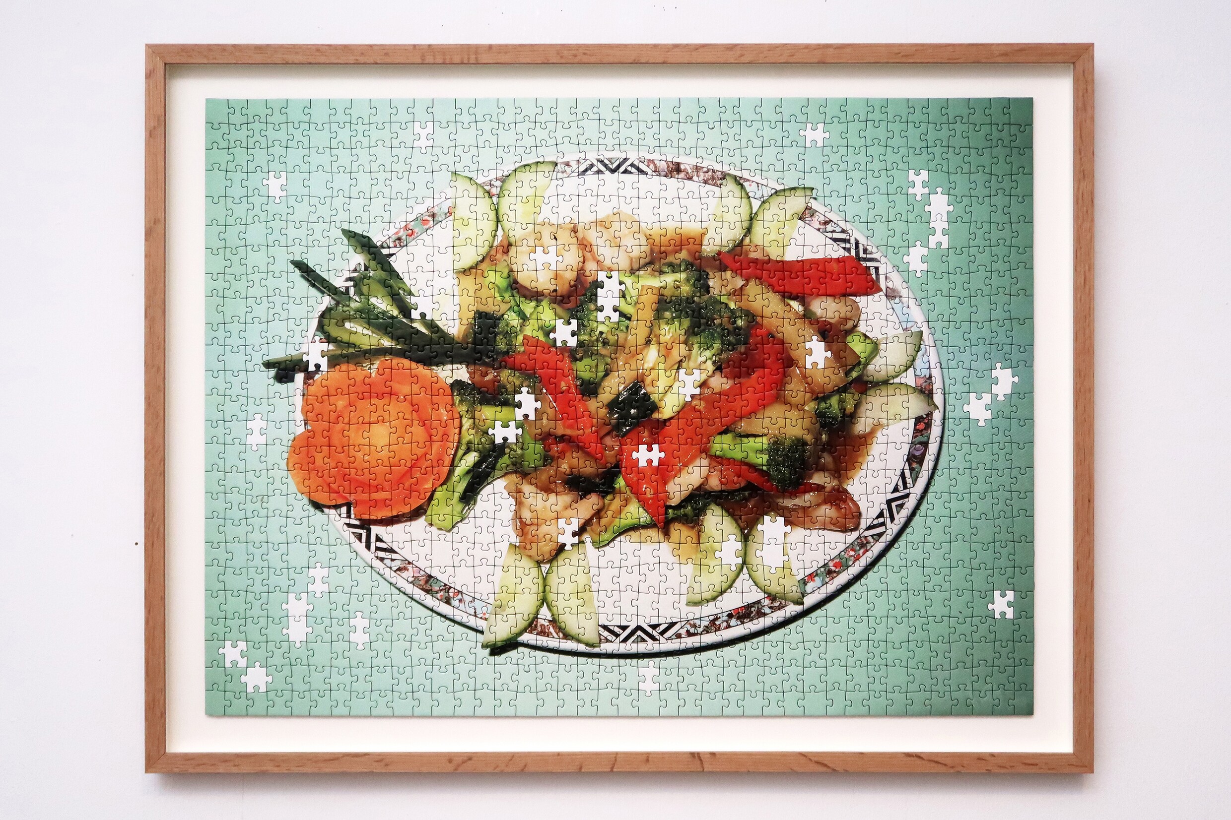 Kunstenaar Benjamin Li zoekt in elk Chin. Ind. restaurant naar de roos van wortel | Het Parool