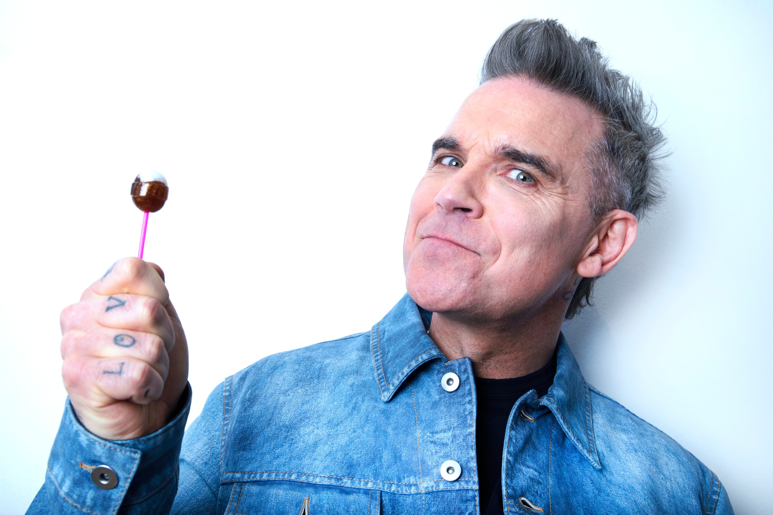 Robbie Williams: ‘Ik word betaald om extravert te zijn, maar in mijn ...