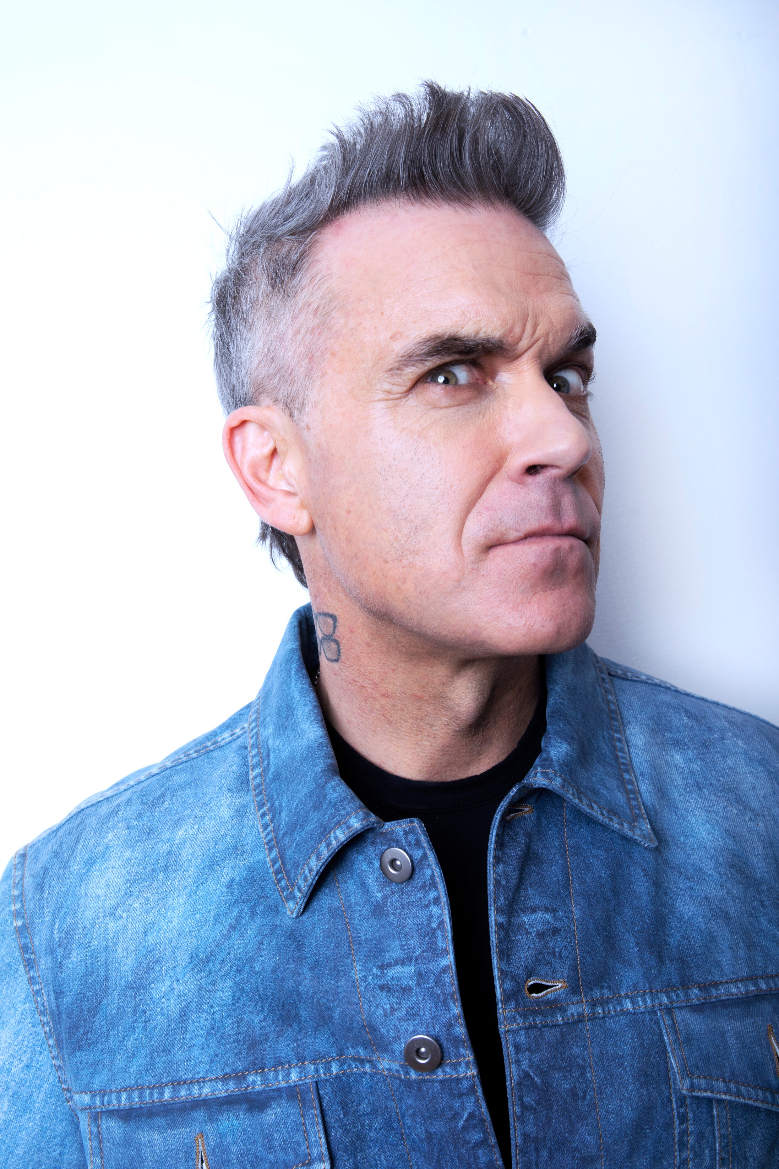 Robbie Williams: ‘Ik word betaald om extravert te zijn, maar in mijn ...