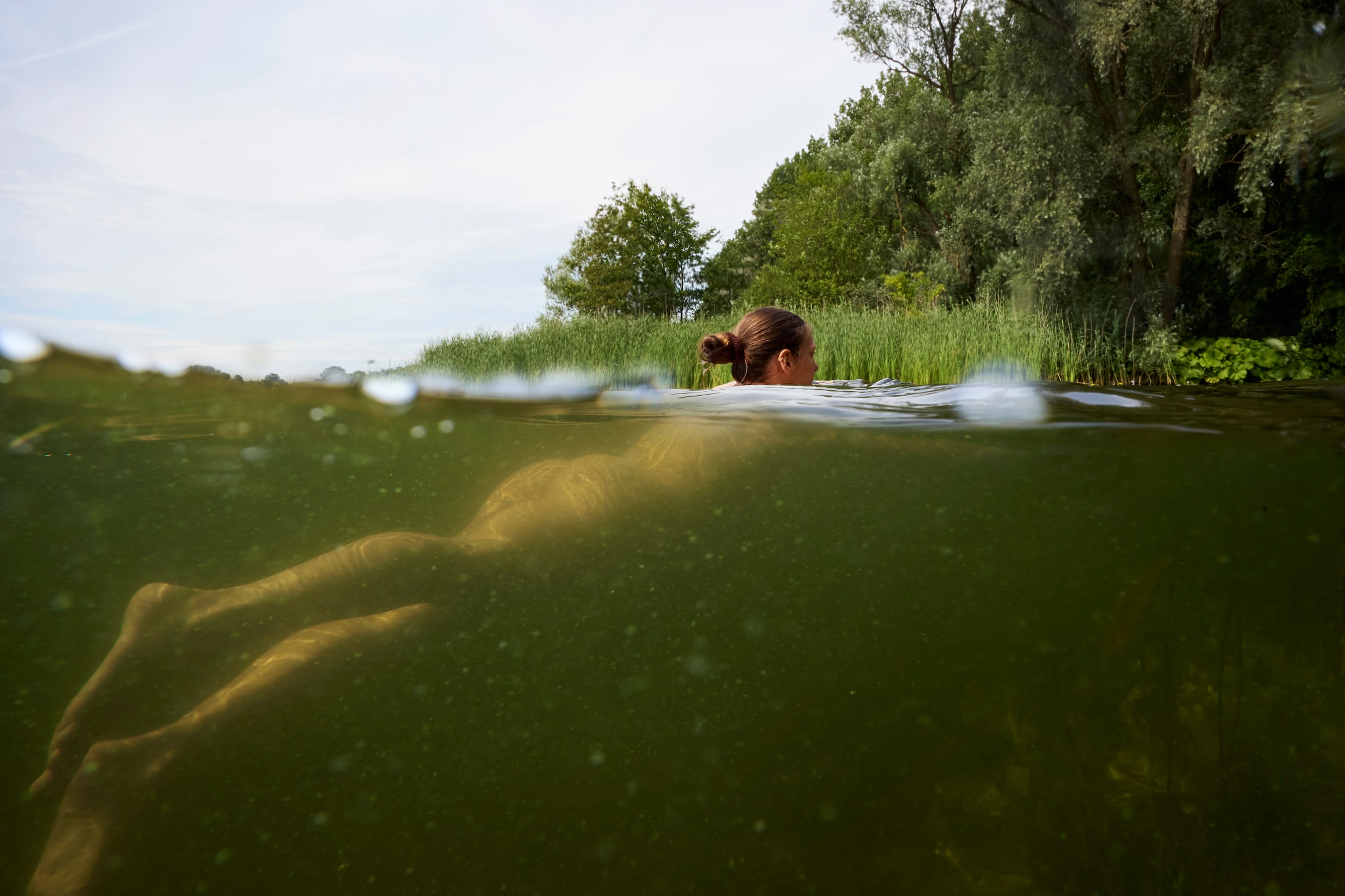 Het leven boven én onder water in een foto: ‘Amsterdam is een waterstad’ | Het Parool