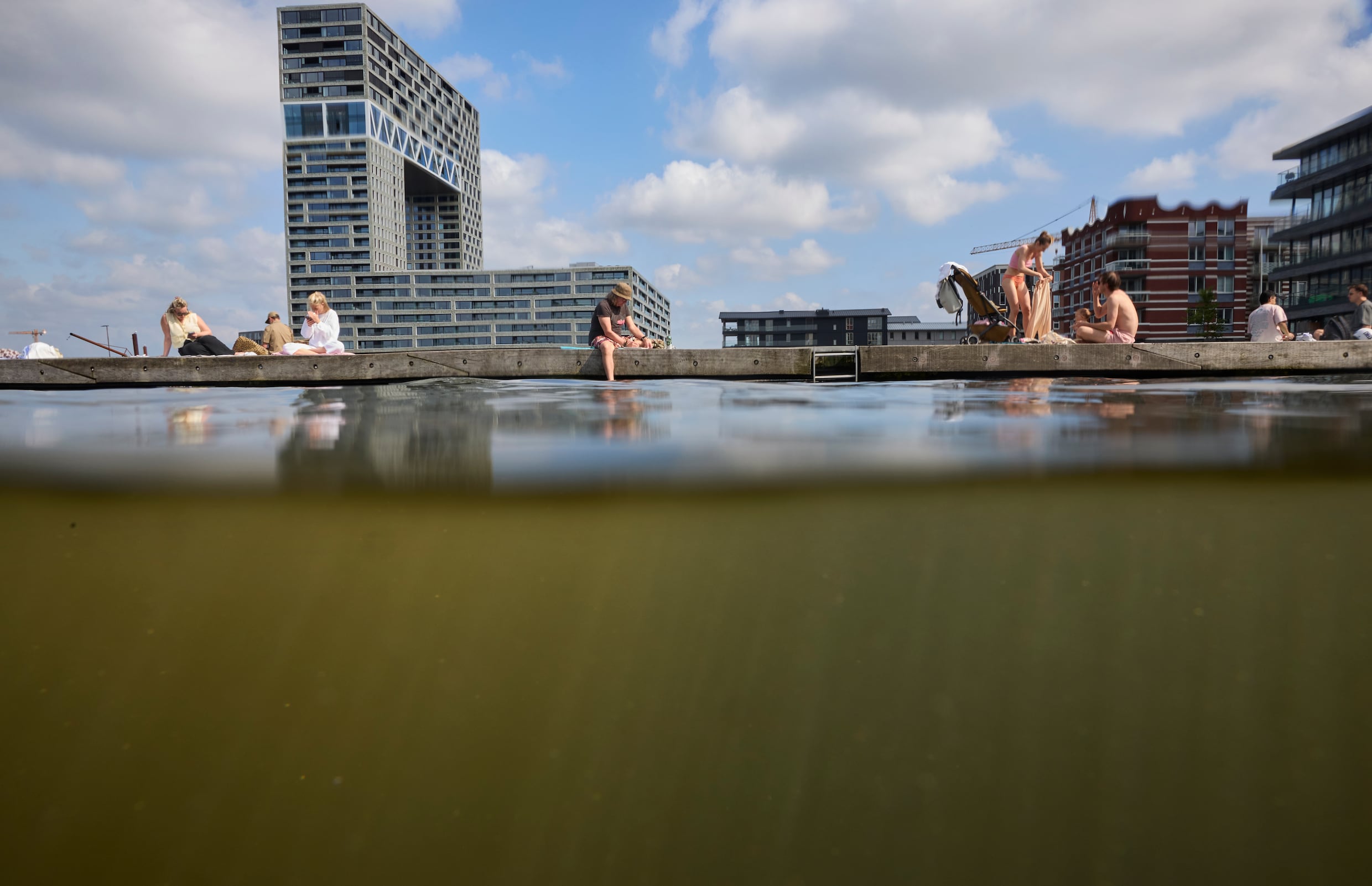 Het leven boven én onder water in een foto: ‘Amsterdam is een waterstad ...