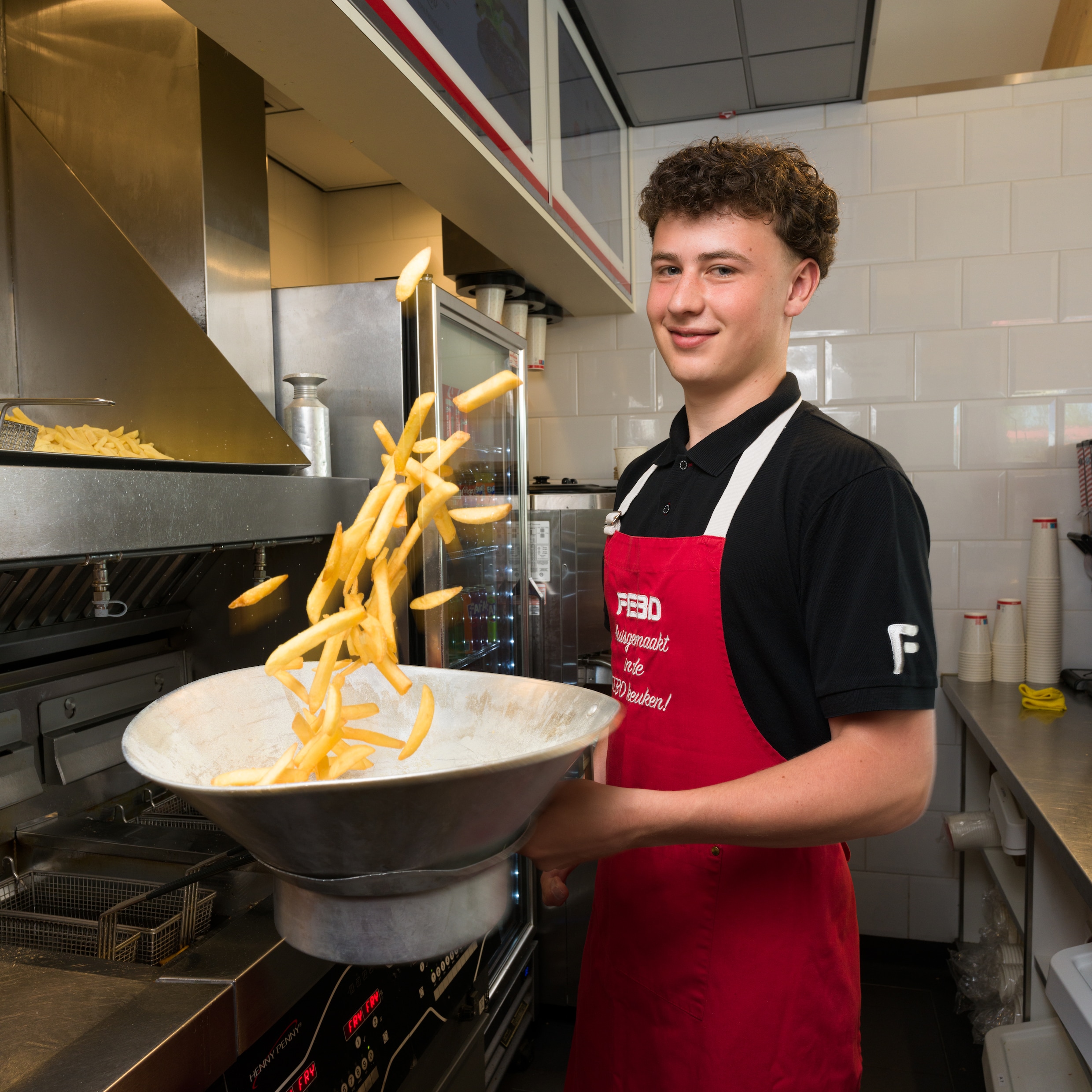 Sjoerd (19) werkt deze zomer tussen de snacks: ‘Als er concerten zijn ...